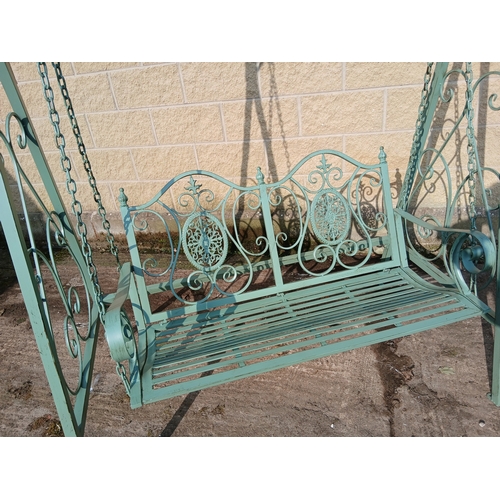 Metal swing bench with decorative scroll design (H 216cm x W 146cm x D ...