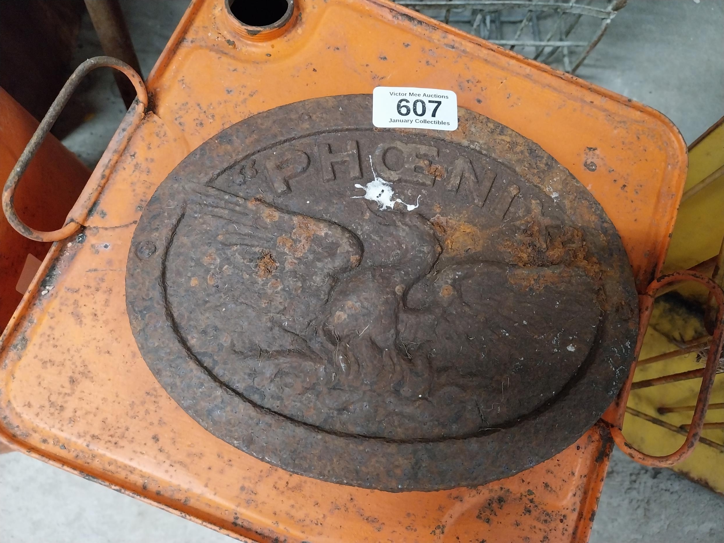 Phoenix cast iron machine plaque. {17 cm H x 22 cm W}.