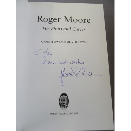 ROGER MOORE BOOKS to include signed copies. (Signatures are believed to ...