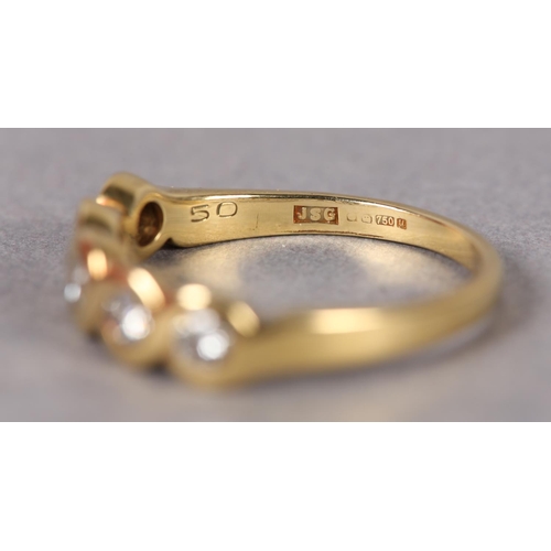 A DIAMOND FIVE STONE RING in 18ct gold, the brilliant cut stones rub ...