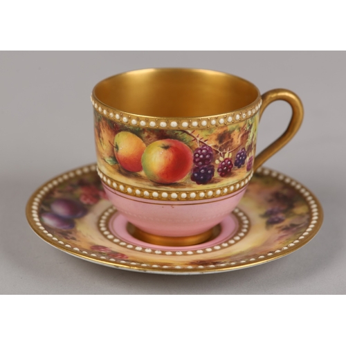 A ROYAL WORCESTER CHINA FRUIT PAINTED CABINET CUP AND SAUCER, signed H E Everett, internally painted