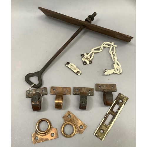 Two pairs of Victorian brass loop sash window pulls, a brass lock plate ...