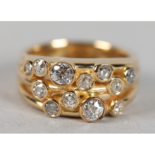 A DIAMOND RING, collet set with Old European and brilliant cut diamonds ...