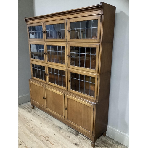 A 1920s oak and leaded glazed stacking bookcase by Minty Library ...