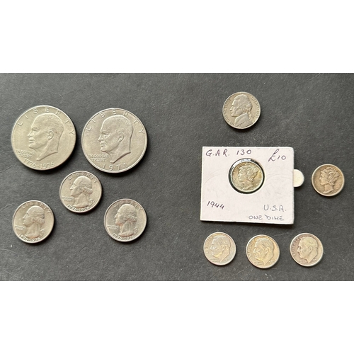 American coins including silver coins ( on the right side ) various ...