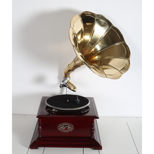 A SOUNDMASTER GRAMOPHONE with stained beechwood case and brass horn ...