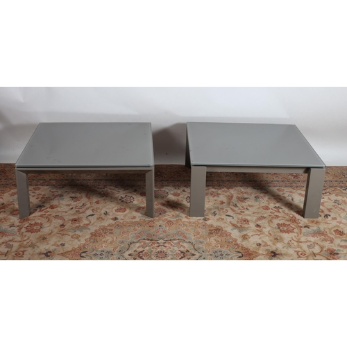 A THREE PIECE CALLIGARIS SUITE comprising a pair of grey coffee tables ...