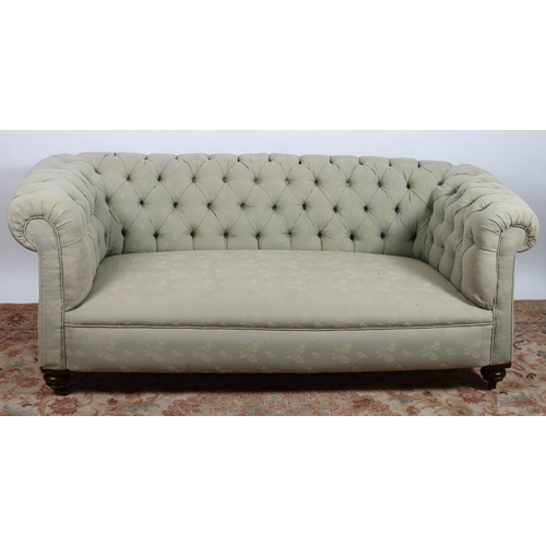 A 19TH CENTURY SETTEE the deep buttoned upholstered scroll over back ...