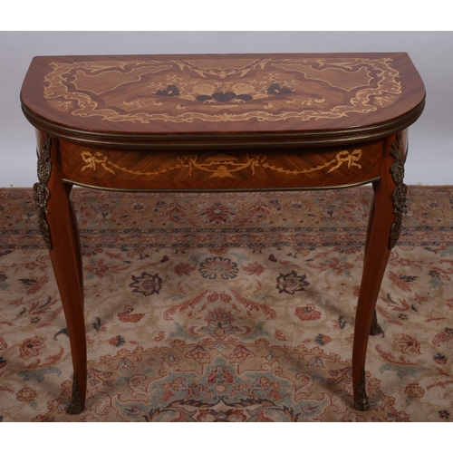 A CONTINENTAL KINGWOOD GILT BRASS MOUNTED AND MARQUETRY FOLDOVER CARD ...