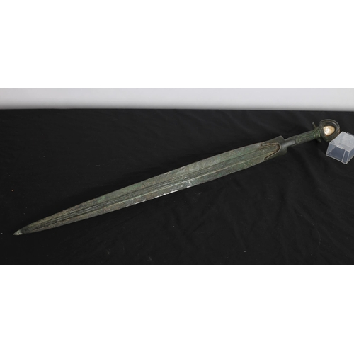 A LURISTAN BRONZE SWORD circa 1000 BC with ribbed fan handle and ...