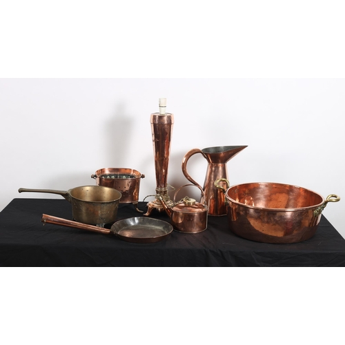 A MISCELLANEOUS COLLECTION OF COPPER AND BRASSWARE to include a copper two handle preserving pan, co
