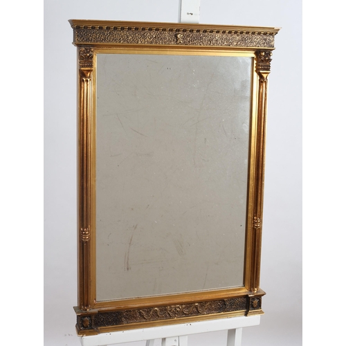 A REGENCY DESIGN GILT FRAME MIRROR the rectangular plate within a ...