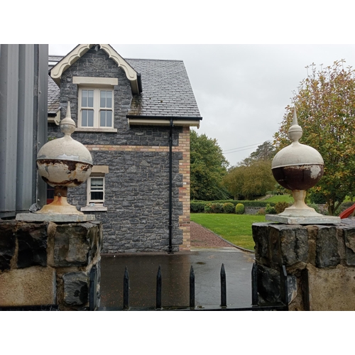 A PAIR OF CAST ALUMINIUM PILLAR CAPS with pointed finials on square ...