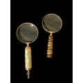 A COPPER MAGNIFYING GLASS with simulated Mother of Pearl handle ...