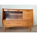 AN EARLY G-PLAN WALNUT SIDE CABINET c.1960s the rectangular top with ...