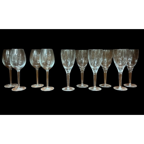 A SET OF SIX JOHN ROCHA WATERFORD CRYSTAL WINE GLASSES, a set of four ...