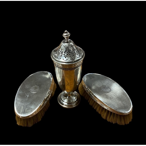 A PAIR OF SILVER ENGINE TURNED BRUSHES, a silver sifter