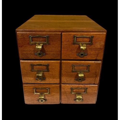 A VINTAGE OAK SIX DRAWER DESK TOP FILING UNIT with brass handles 36cm ...