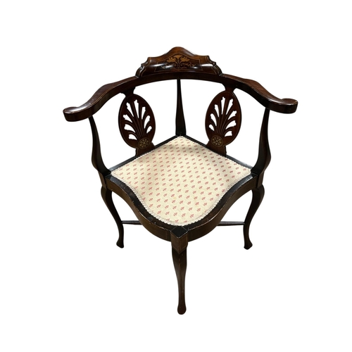 AN EDWARDIAN MAHOGANY MARQUETRY INLAID CORNER CHAIR with upholstered ...
