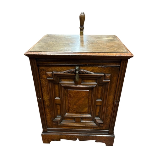 AN EDWARDIAN WALNUT FUEL BIN the hinged compartment containing a liner ...