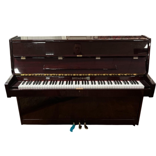 A BROADWAY ROSEWOOD CASED UPRIGHT PIANO steel frame and overstrung ...