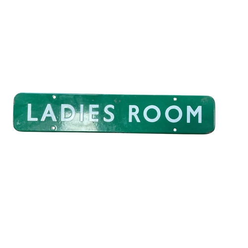 AN ENAMELLED LADIES ROOM SIGN 9cm (h) x 46cm (w)