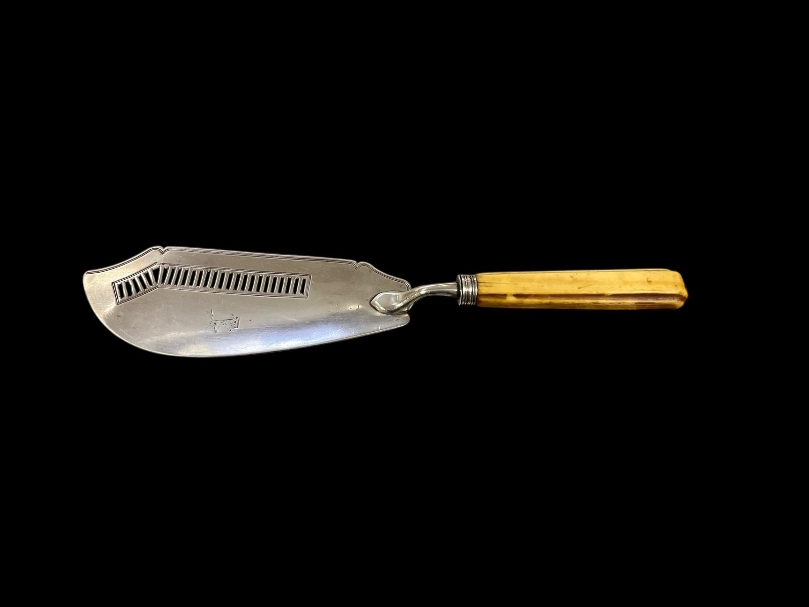 A STERLING SILVER FISH SLICE London 1802