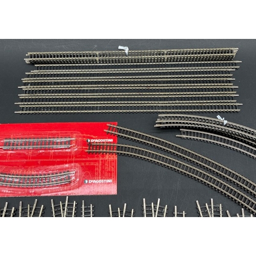 A small quantity of N gauge pre-used track, includes 11 Trix turnouts ...