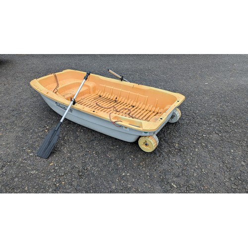 A BIC 245 Plastic Rowing Boat With Oars