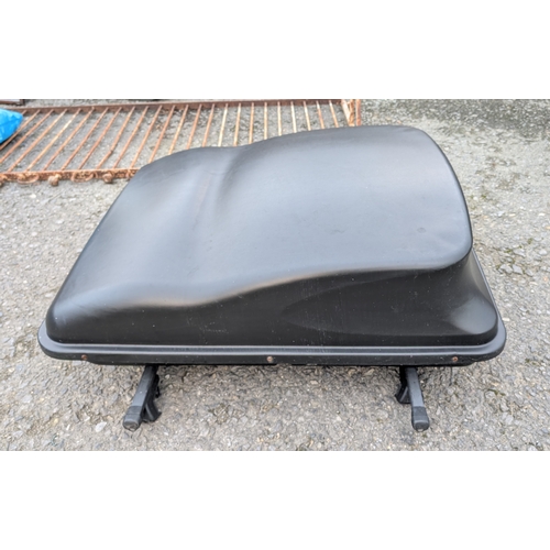 An Auto-Plas Car Roof Box and Roof Bars Moulded black plastic roof box ...