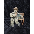 1 x tramp on bench figurine