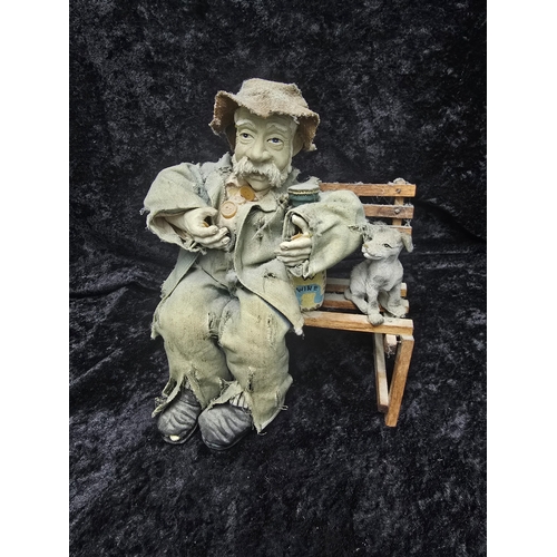 tramp on bench figurine