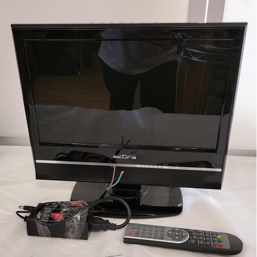 Akura 15.9inch TV with Remote W/O. Requires Plug. This Lot is ...