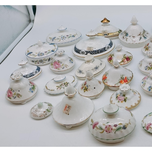 Quantity of Assorted Pattern and Size Lids.
