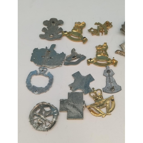 Large Mixed Collection of Broken Military Cap Badges.