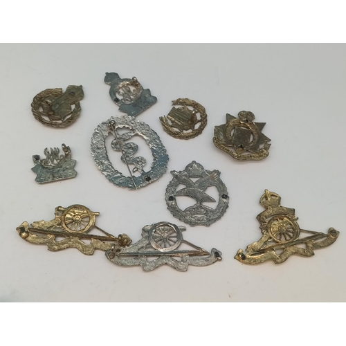 Large Mixed Collection of Broken Military Cap Badges.