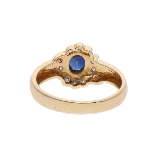 18ct Gold Sapphire and Diamond Cluster Ring. HALLMARKS: marked for 18ct ...