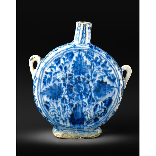 A BLUE AND WHITE SAFAVID POTTERY MOON FLASK, PERSIA, 17TH CENTURY