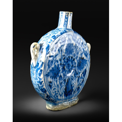 A BLUE AND WHITE SAFAVID POTTERY MOON FLASK, PERSIA, 17TH CENTURY