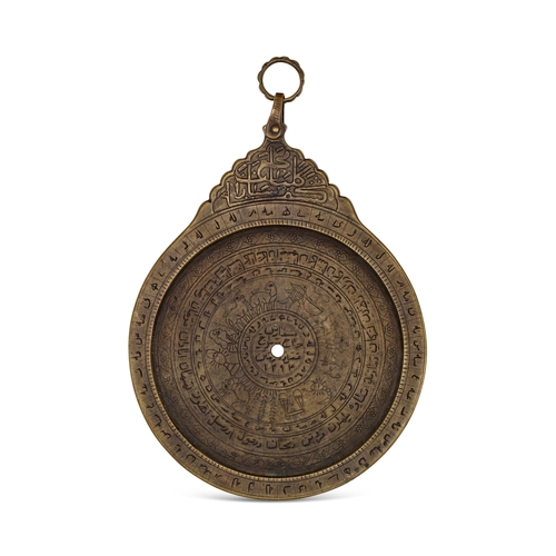 AN ENGRAVED BRASS QAJAR ASTROLABE, PERSIA, 19TH CENTURY A finely ...