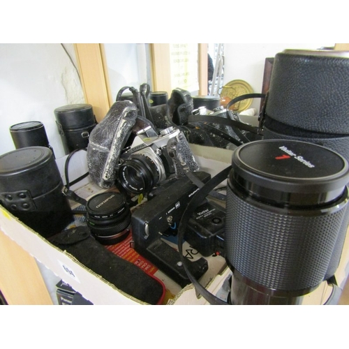 CAMERA EQUIPMENT, an Olympus OM1 camera in original strapped leather ...
