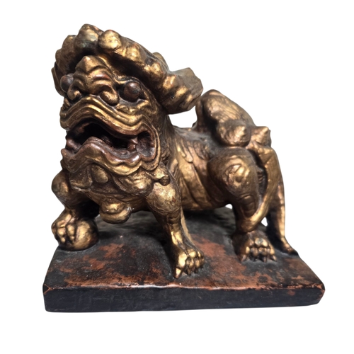 Pair of Chinese gilt terracotta guardian lions (Shi-shi / Foo dogs ...