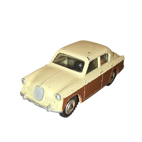 Dinky Toys No. 168 Singer Gazelle with No. 190 Caravan, c.1950s. A ...