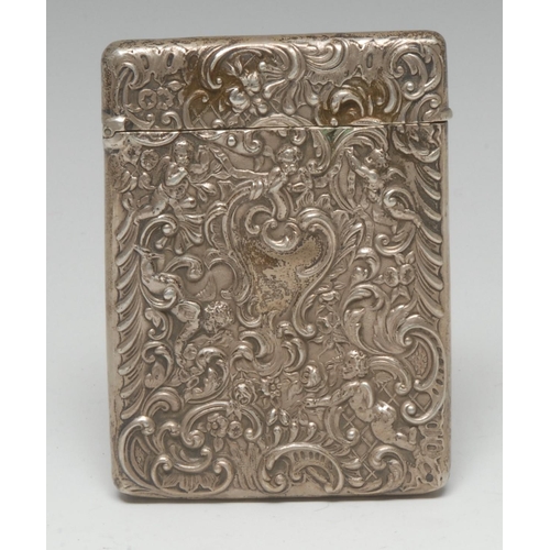 A Victorian silver rounded rectangular visiting card case, embossed ...