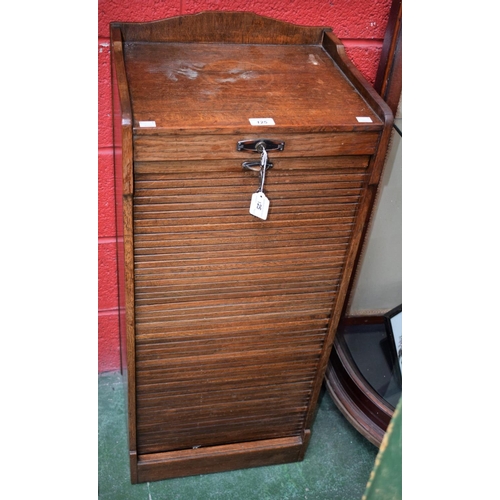 A 20th century oak filing cabinet, shallow three quarter gallery above ...