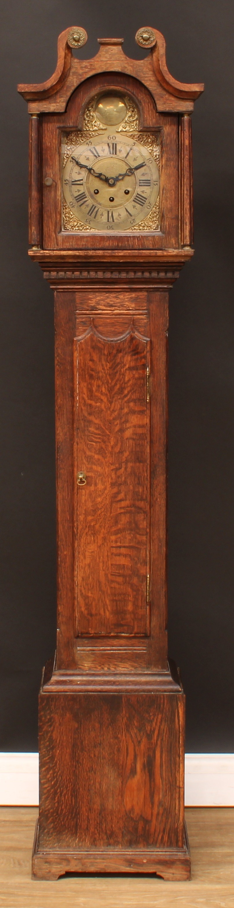 A Gustav Becker oak dwarf longcase clock, arched brass dial ...