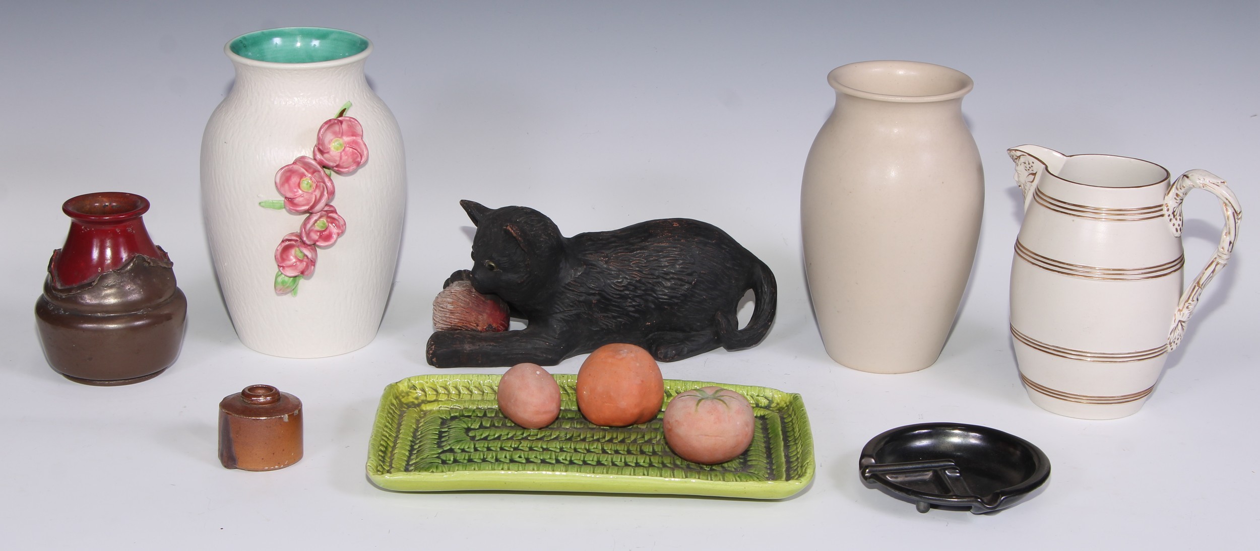 Ceramics - a Bretby model of a cat - auctions & price archive