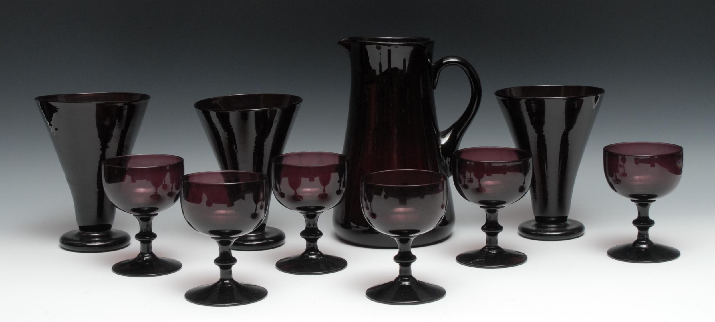 A 19th century amethyst glass lemonade set, for six, comprising goblets ...