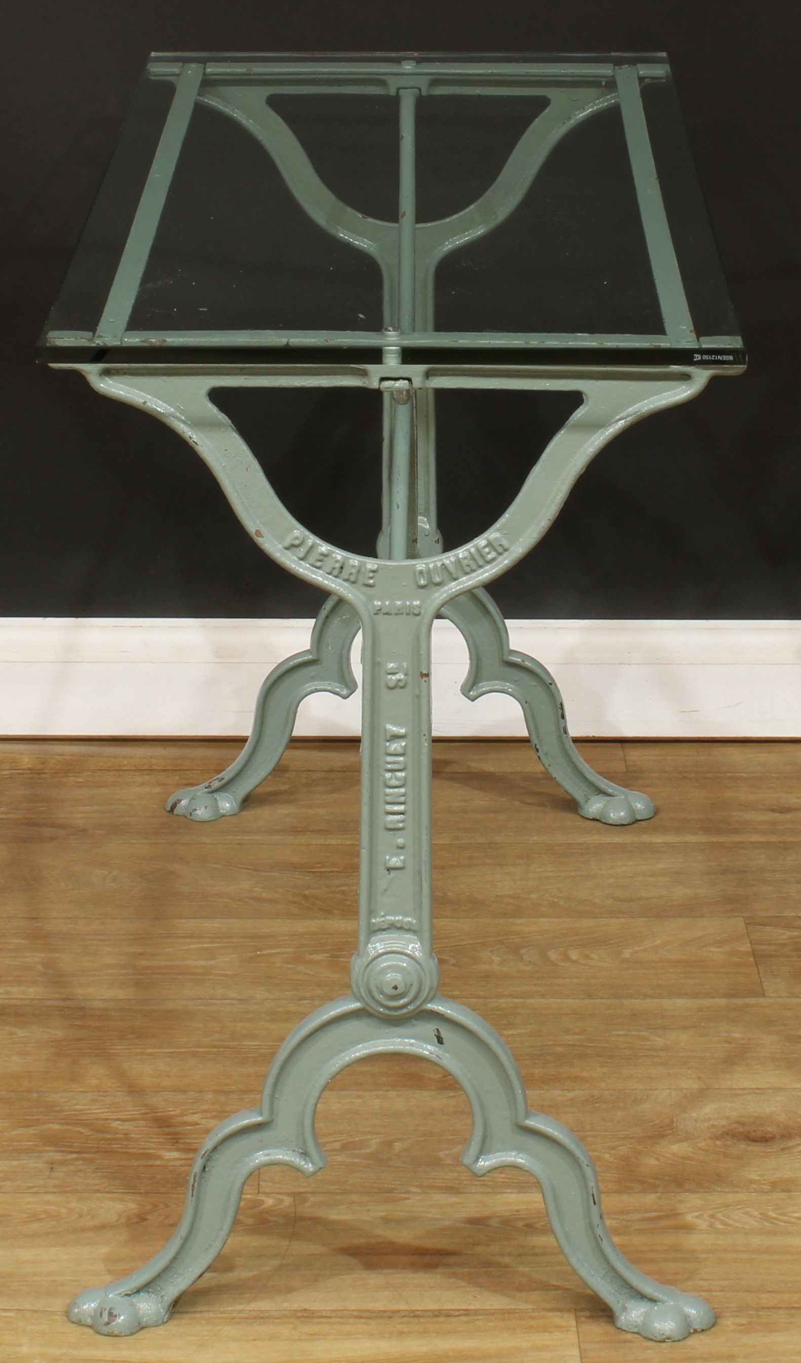 A fin-de-siècle French cast iron patisserie table, by Pierre Ouvrier, E ...
