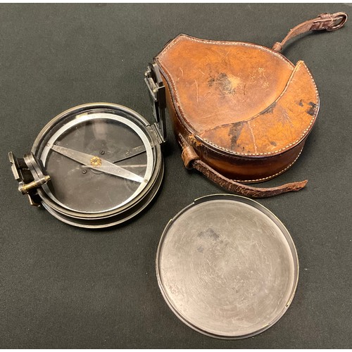 An early to mid 20th century Elliot Brother prismatic compass, faint ...